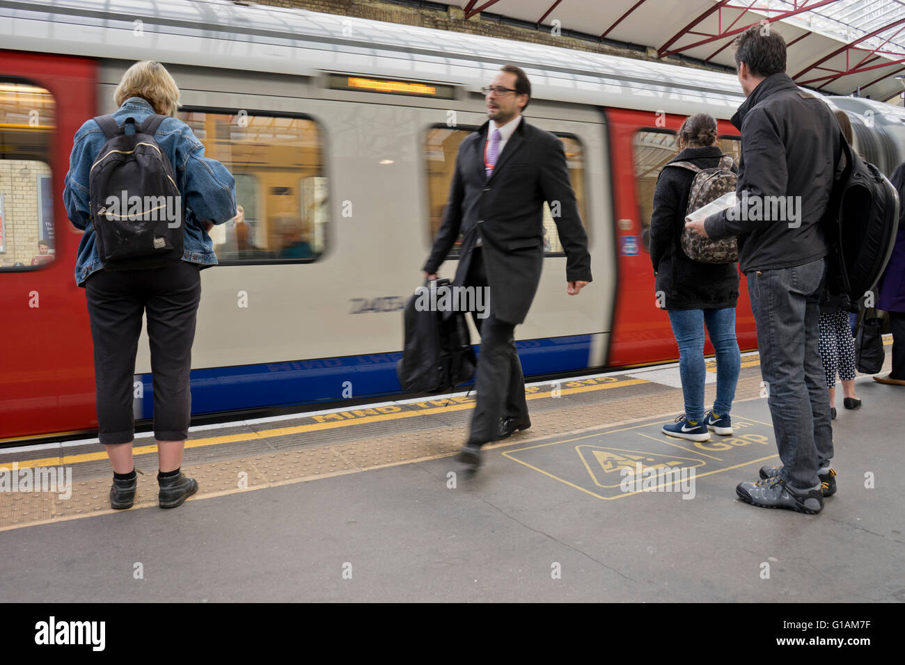 Commuters in an underground tube station in London, UK Stock Photo - Alamy