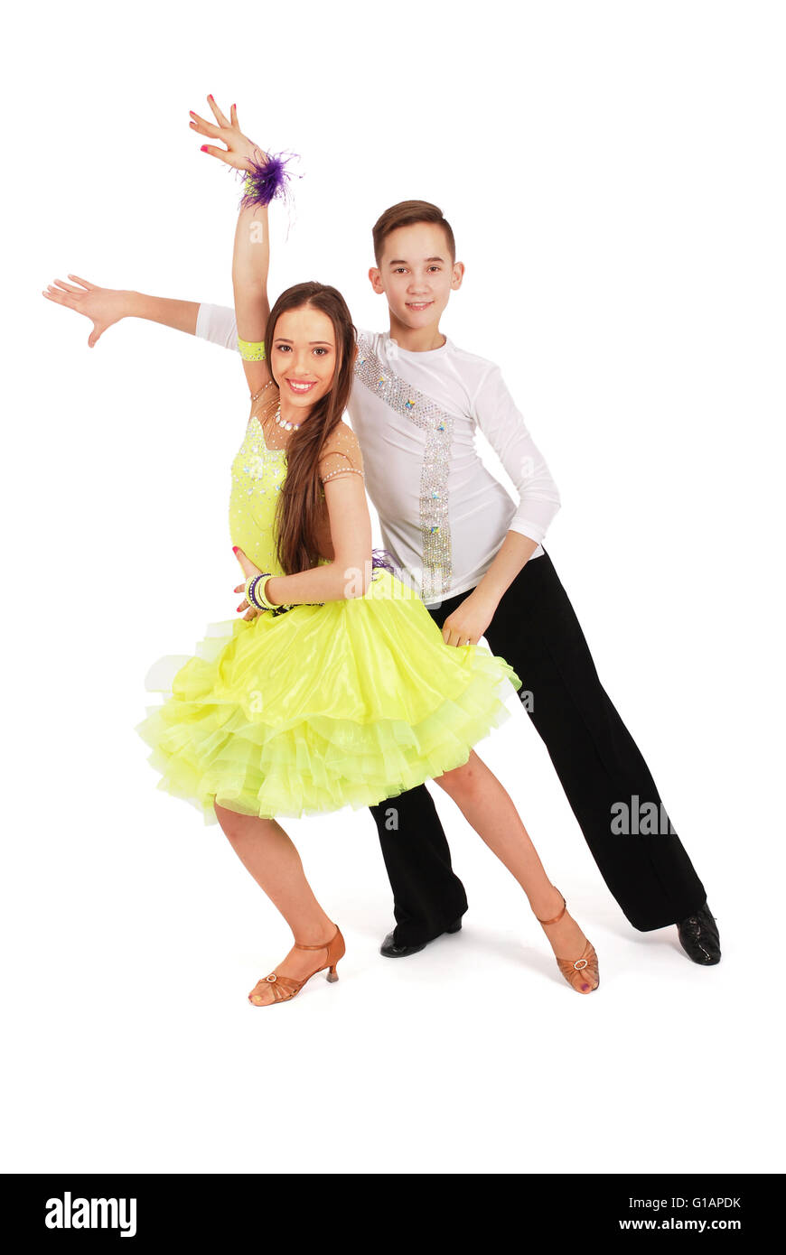 Boy and girl dancing ballroom dance on white background Stock Photo - Alamy