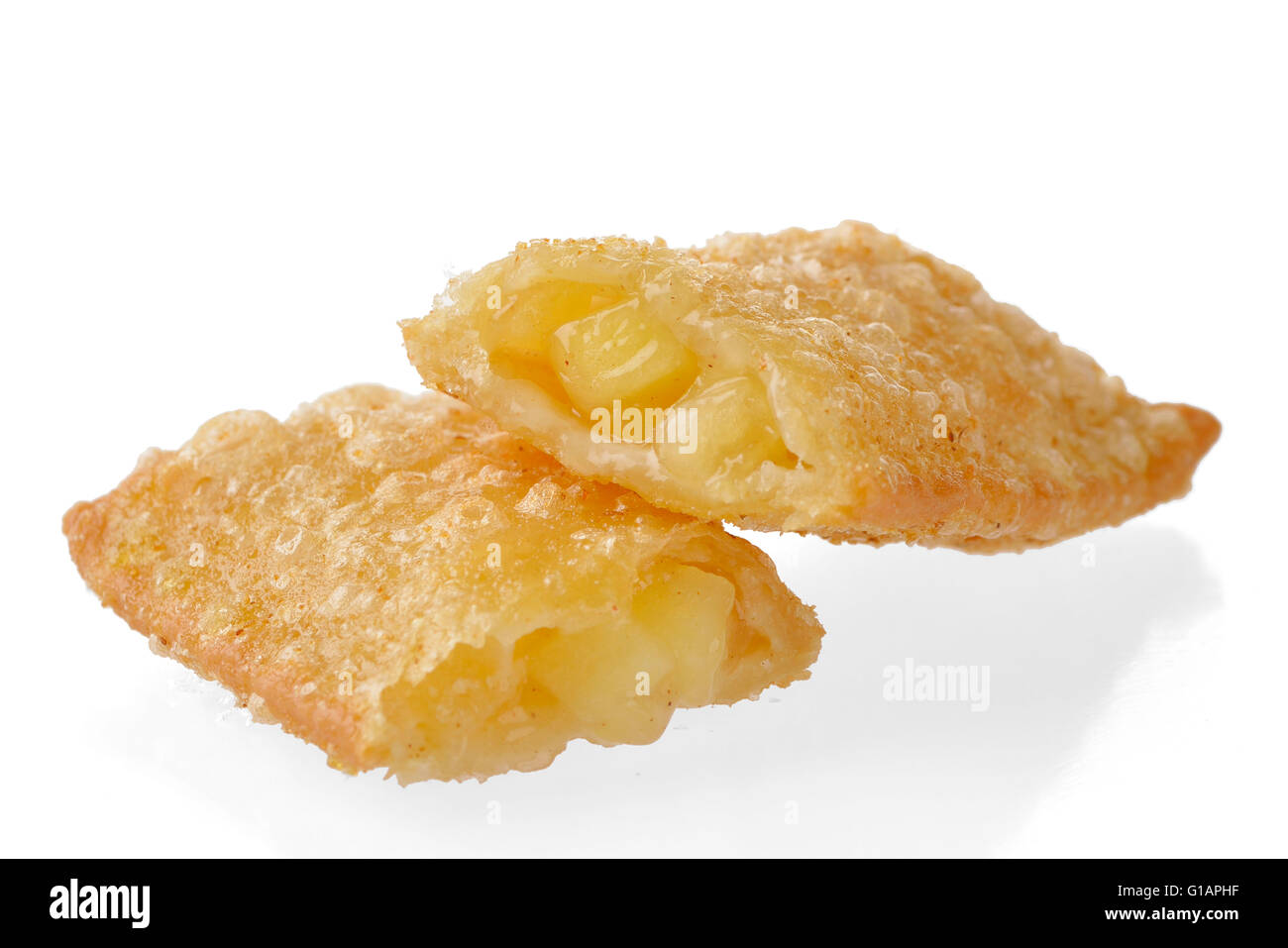 Apple strudel cut open on a white background Stock Photo - Alamy