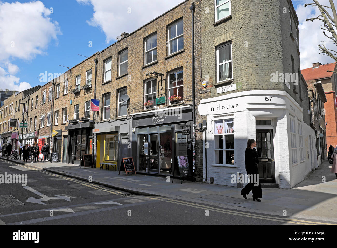 Terraced housing with shops hi-res stock photography and images - Alamy