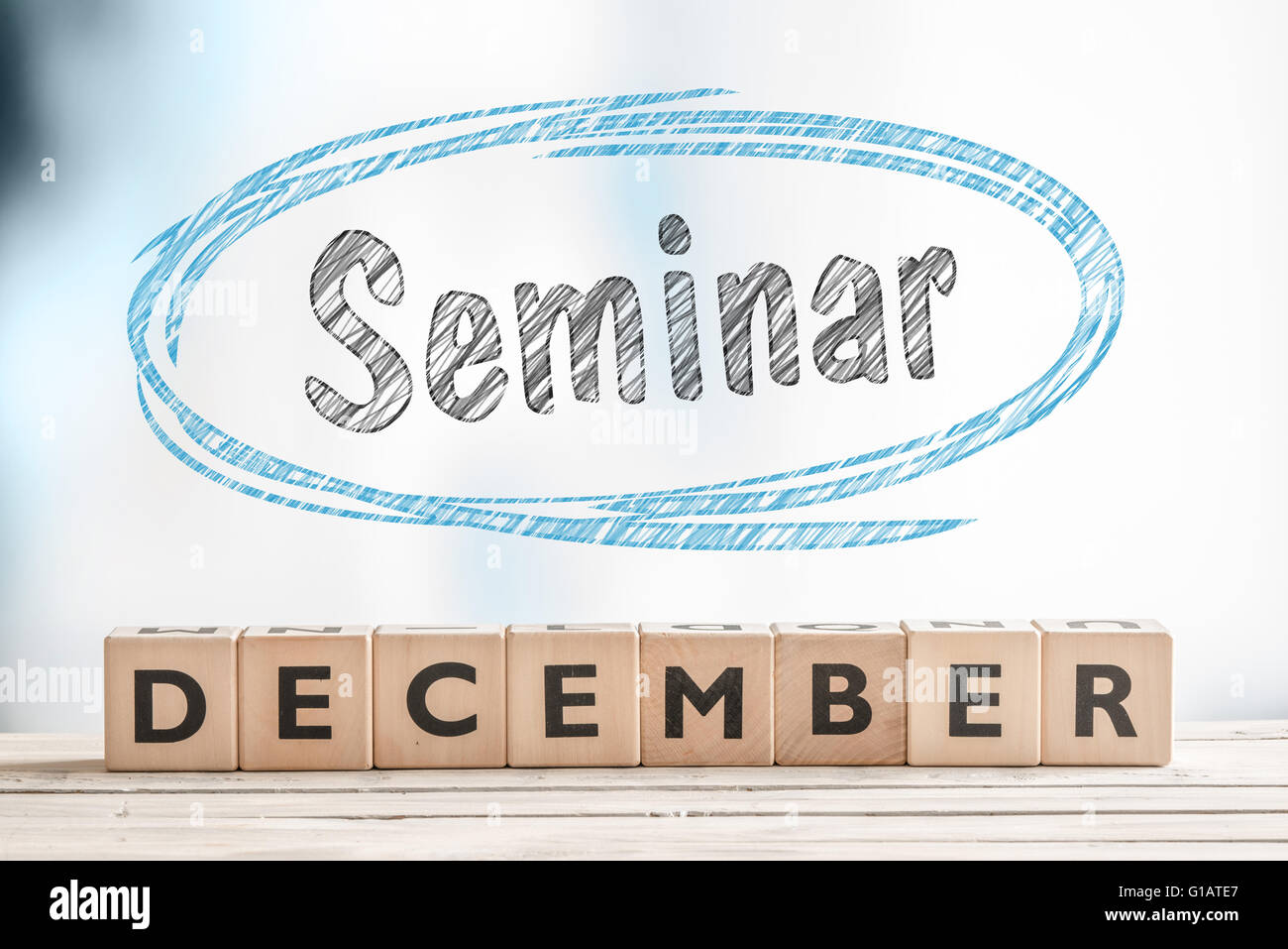 December seminar sign on a stage made of wood Stock Photo - Alamy
