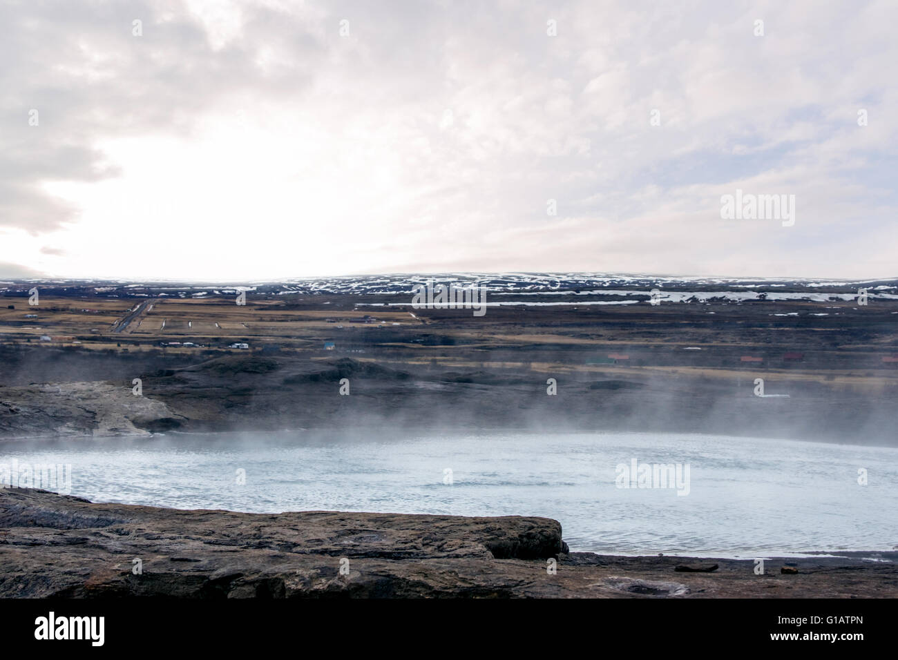 Hot water pond with steam in Iceland Stock Photo - Alamy