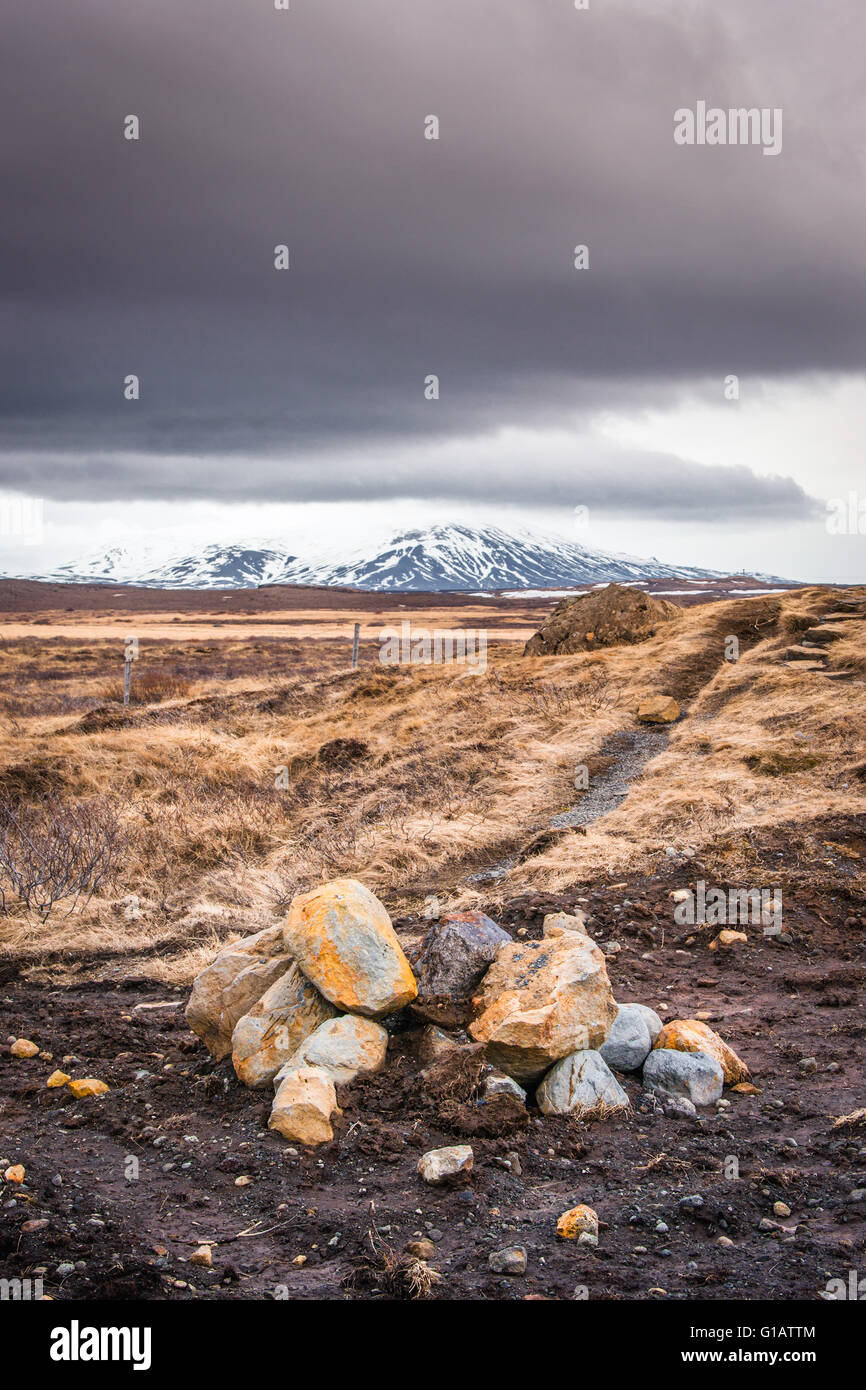 Rocks in a highland landscape with cloudy weather Stock Photo - Alamy