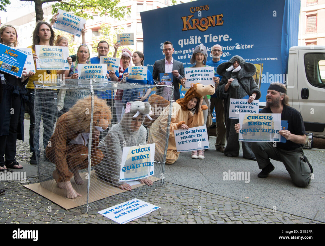 Animal rights activists wearing animal costumes or holding up signs ...