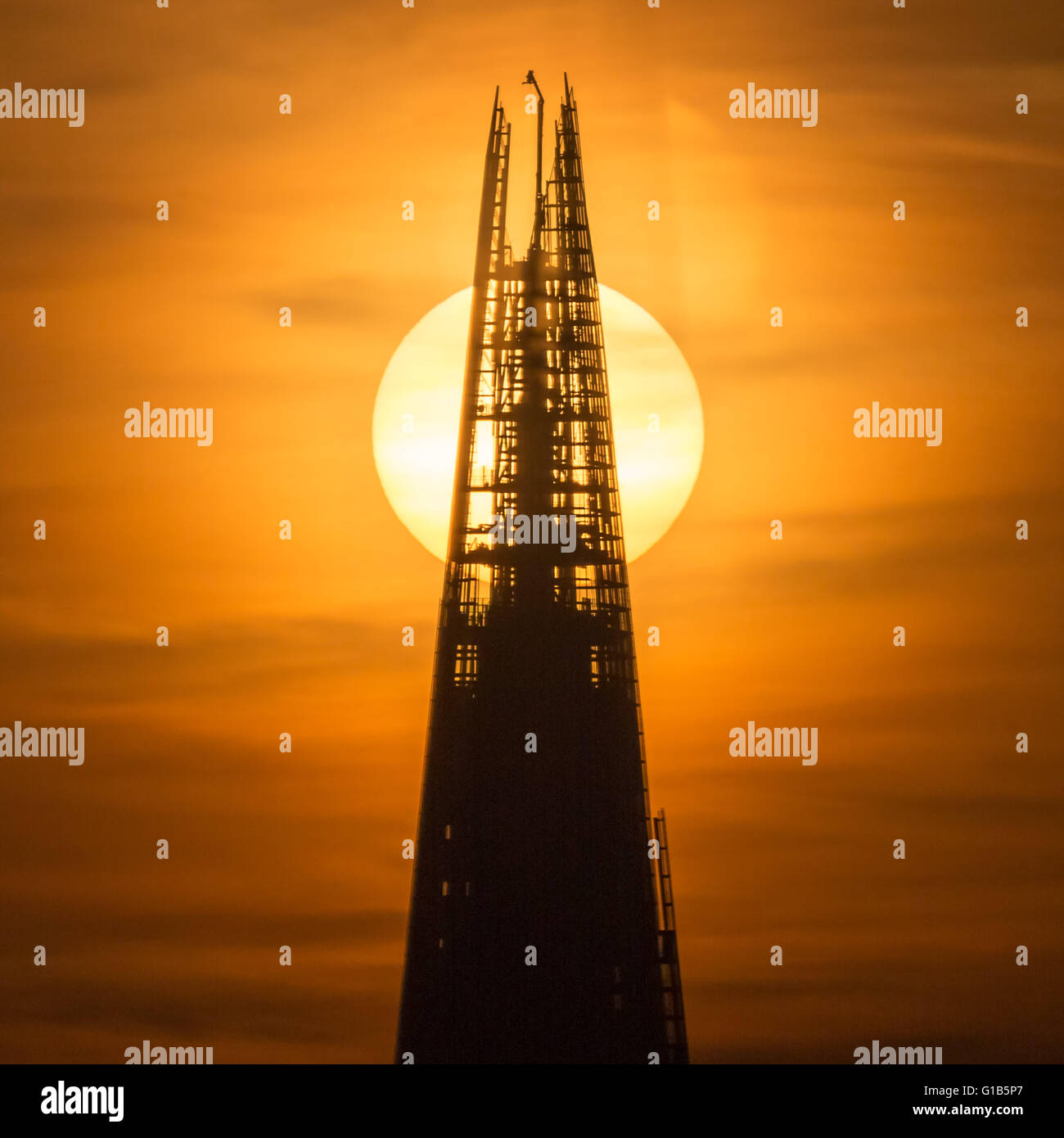 London, UK. 12th May, 2016. Split Sunset behind The Shard building in ...