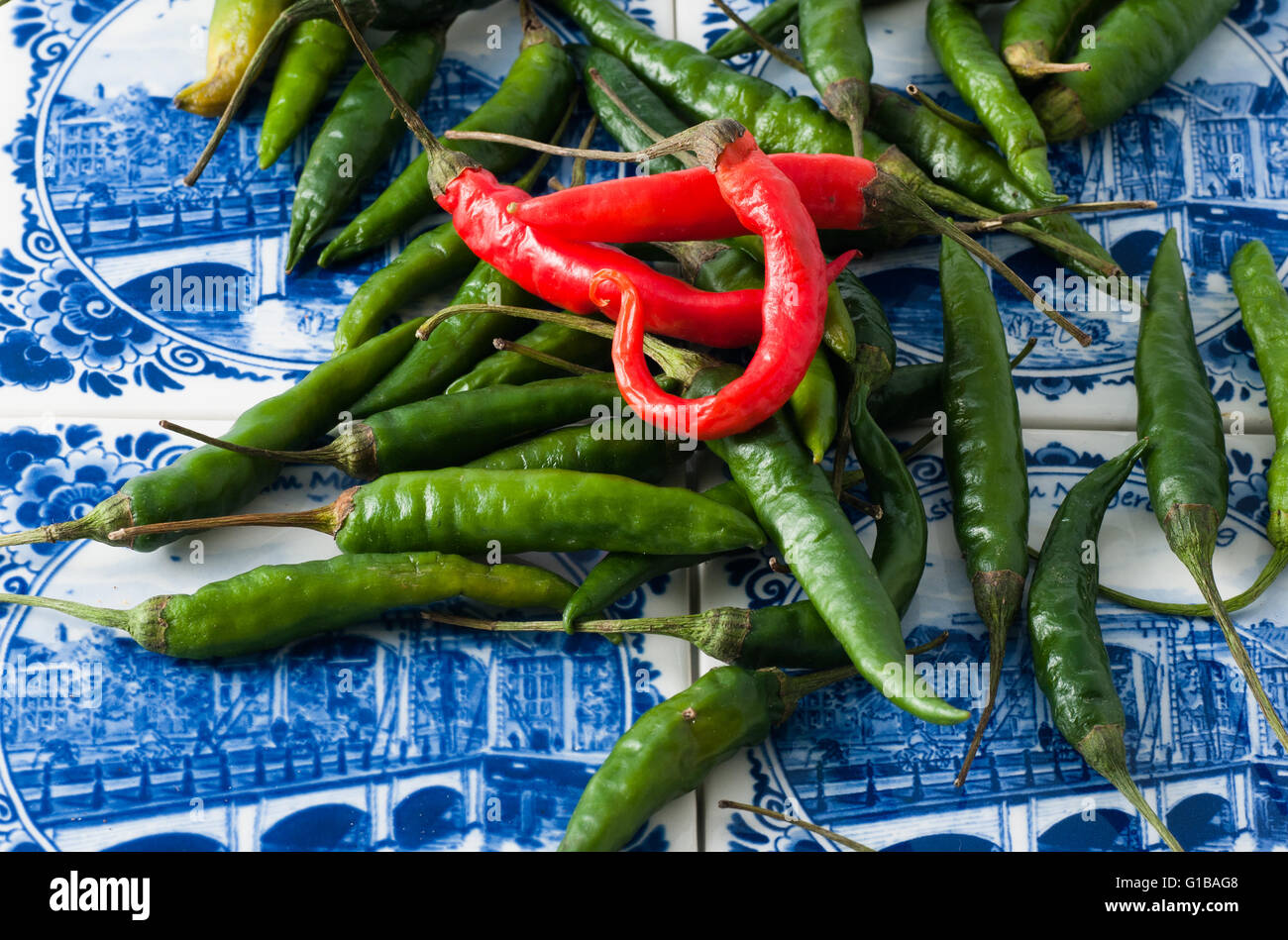 Red and green hot chili peppers Stock Photo - Alamy