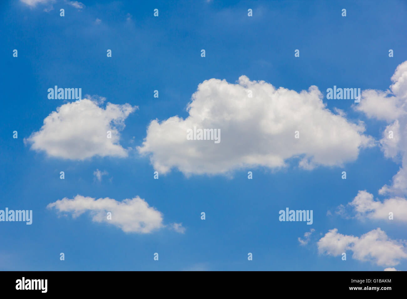 blue sky and small cloud background Stock Photo - Alamy