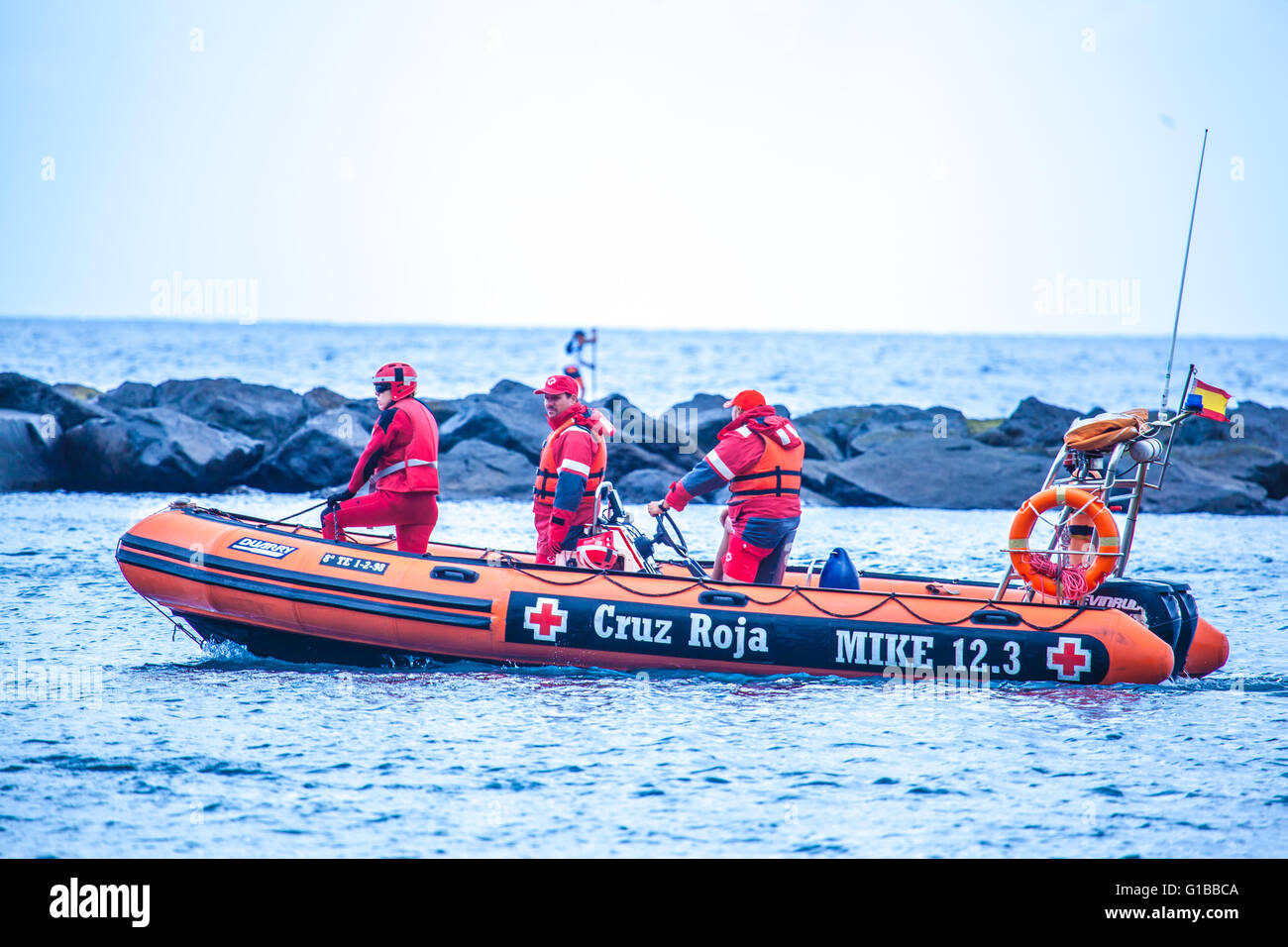 spanish red cross boat on the seaside Stock Photo - Alamy