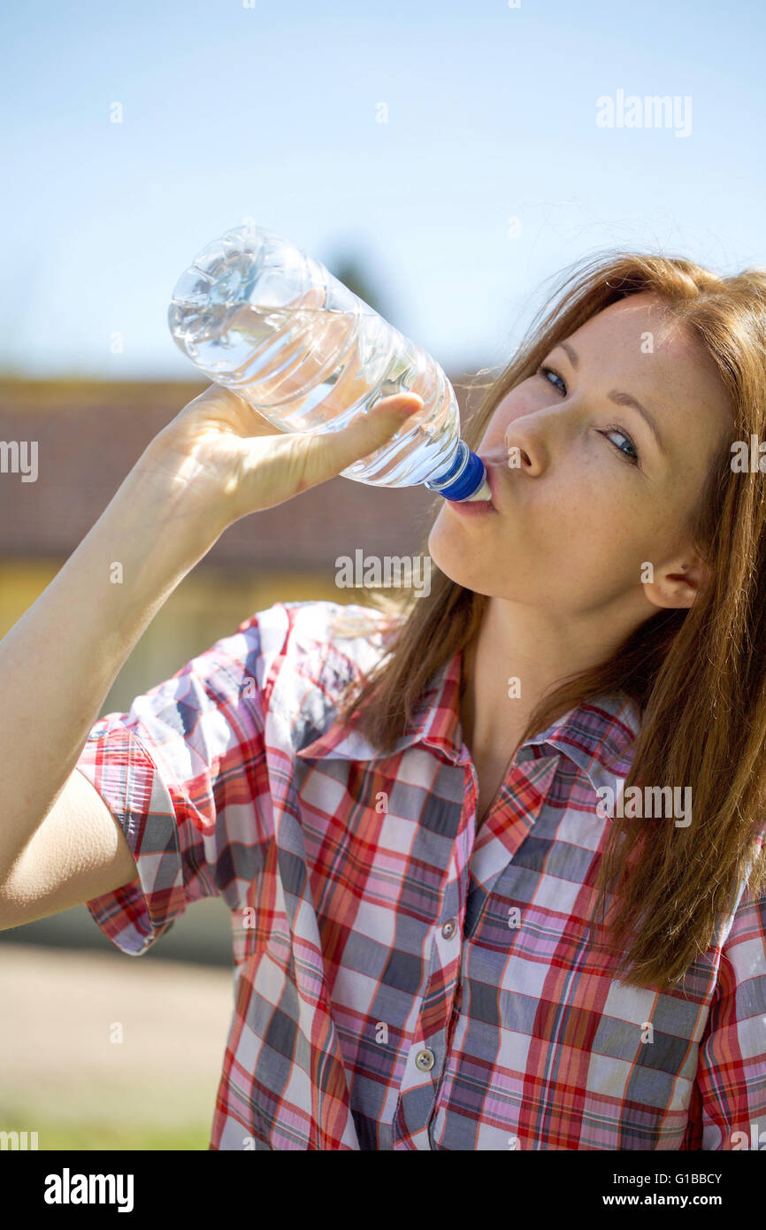 Beautiful woman enjoying drinking water hi-res stock photography and ...