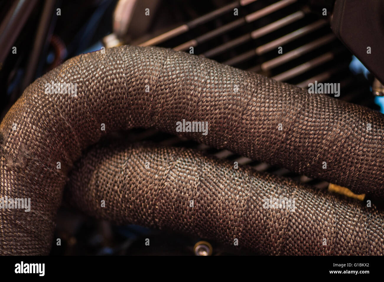 Detail of a motorcycle exhaust pipes and cylinders Stock Photo - Alamy