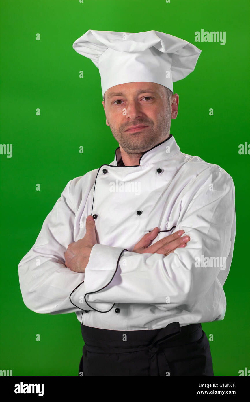 serious chef standing with his arms crossed Stock Photo - Alamy
