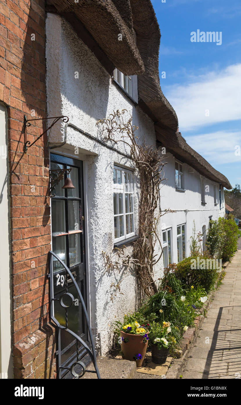 Row of charming thatched cottages in Dorchester Road, Tolpuddle, Dorset ...