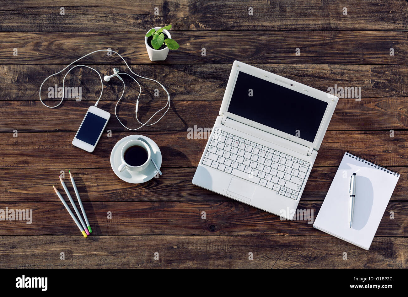 Top view of working Place on natural wooden Table Stock Photo - Alamy