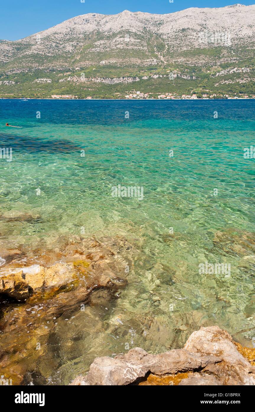 Amazing beach with stones in Kocula, Croatia. Adriatic sea with ...
