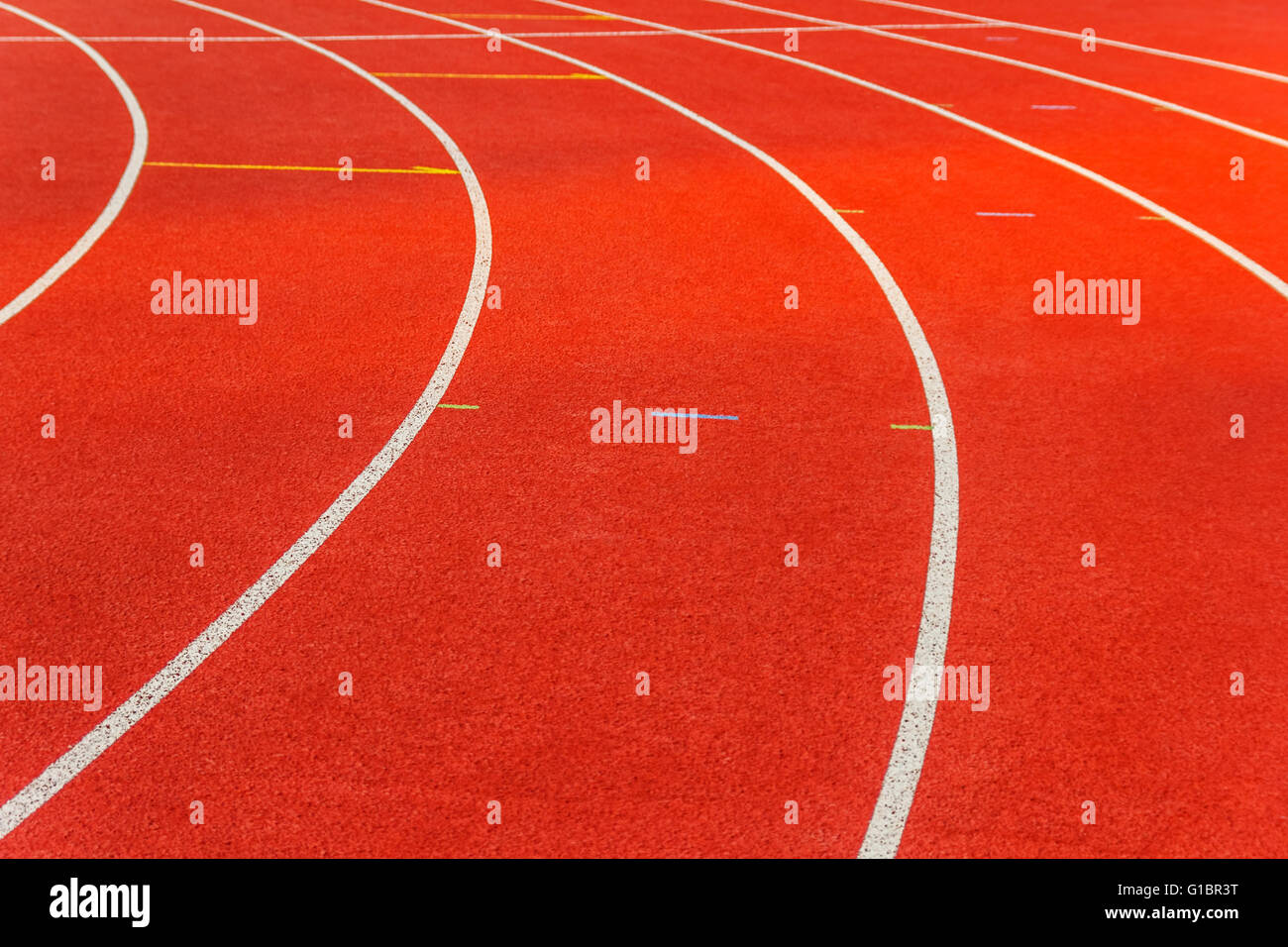 Beauty red treadmill at stadium in day Stock Photo - Alamy