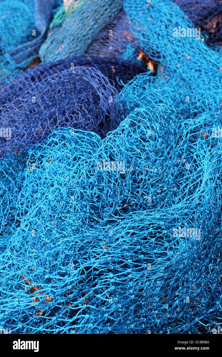 blue fishing nets background Stock Photo - Alamy