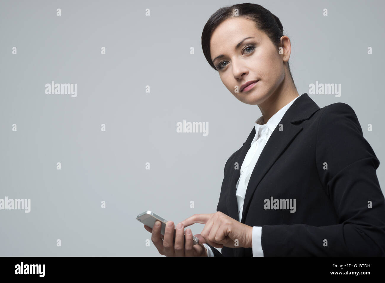 Smiling corporate woman using hi-res stock photography and images - Alamy