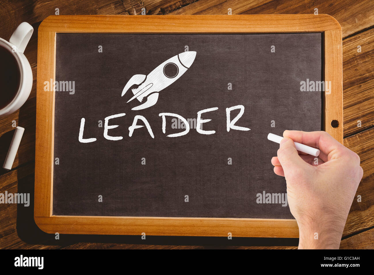 Composite image of hand writing with a white chalk Stock Photo - Alamy