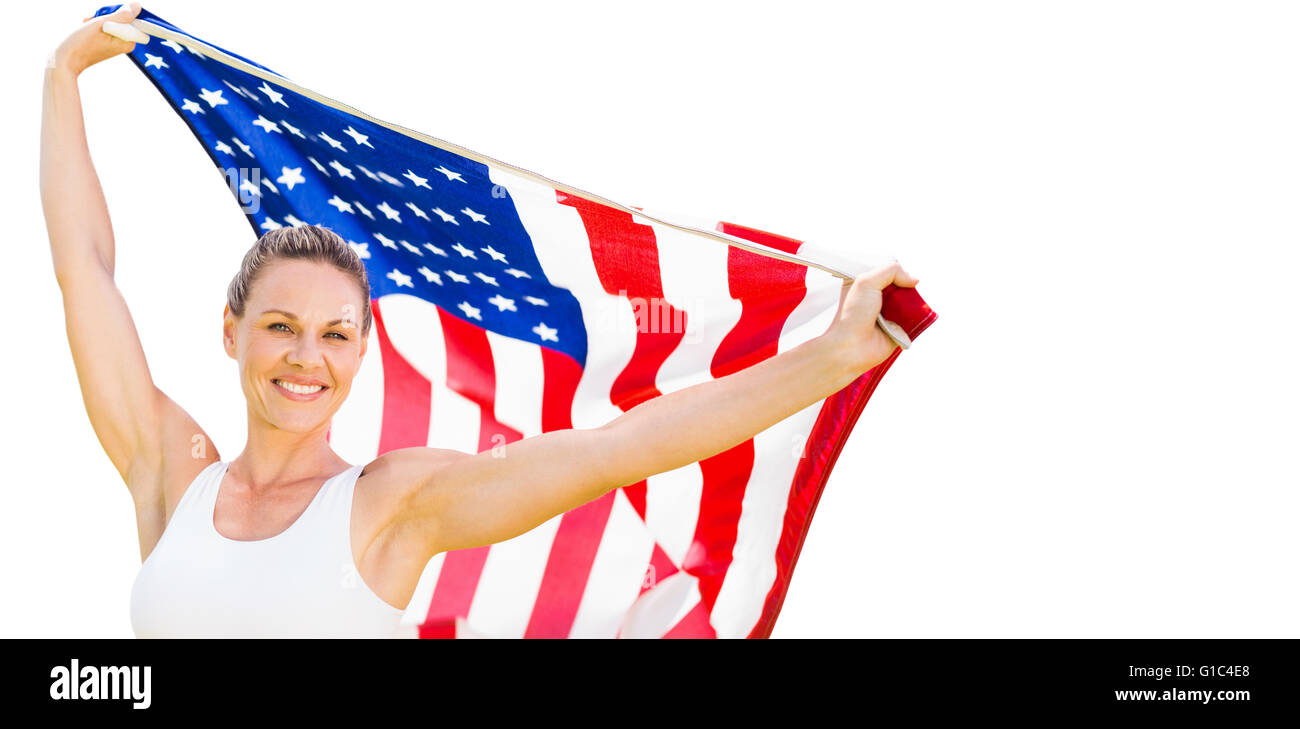 Portrait of happy sportswoman posing with an american flag Stock Photo ...