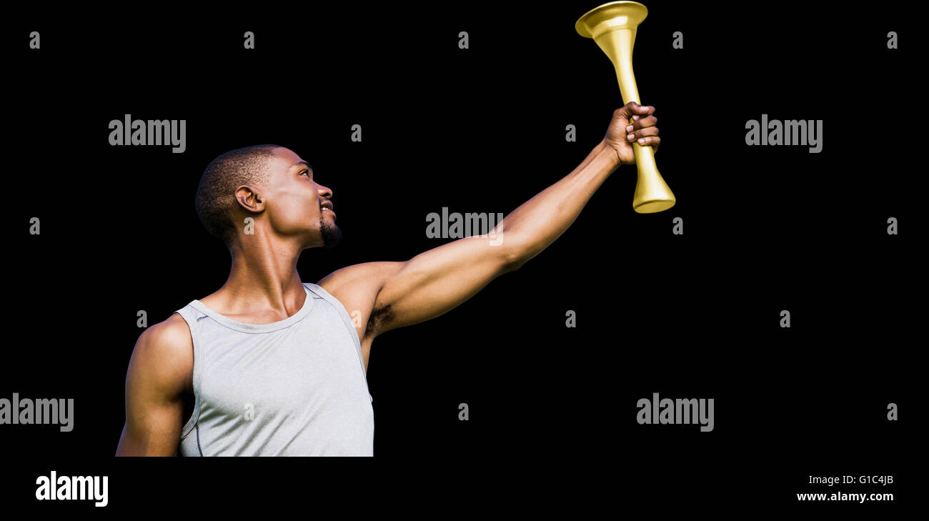 Front view of sportsman holding a cup Stock Photo - Alamy