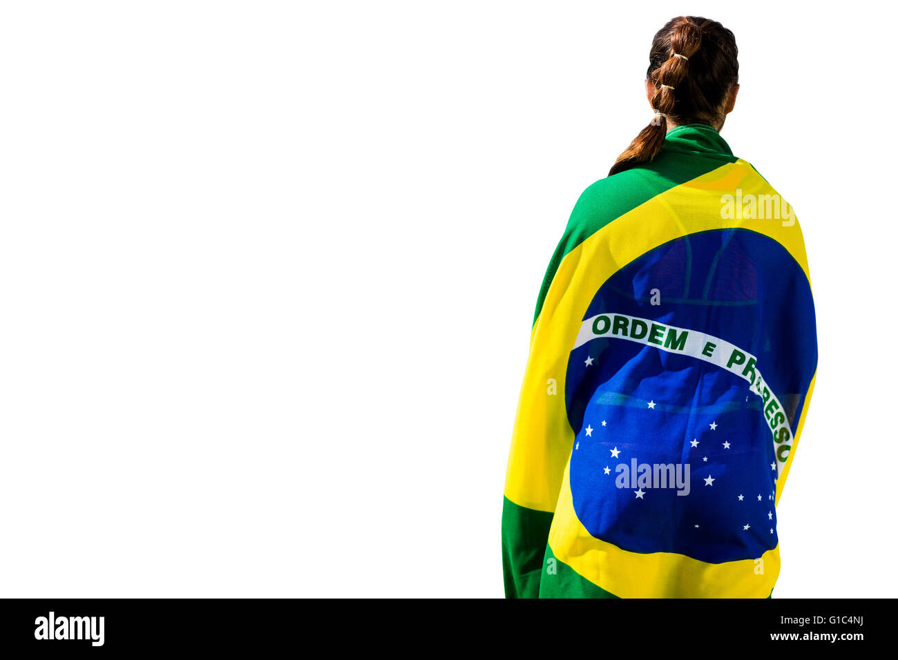 Rear view of sporty woman holding the Brazilian flag Stock Photo - Alamy