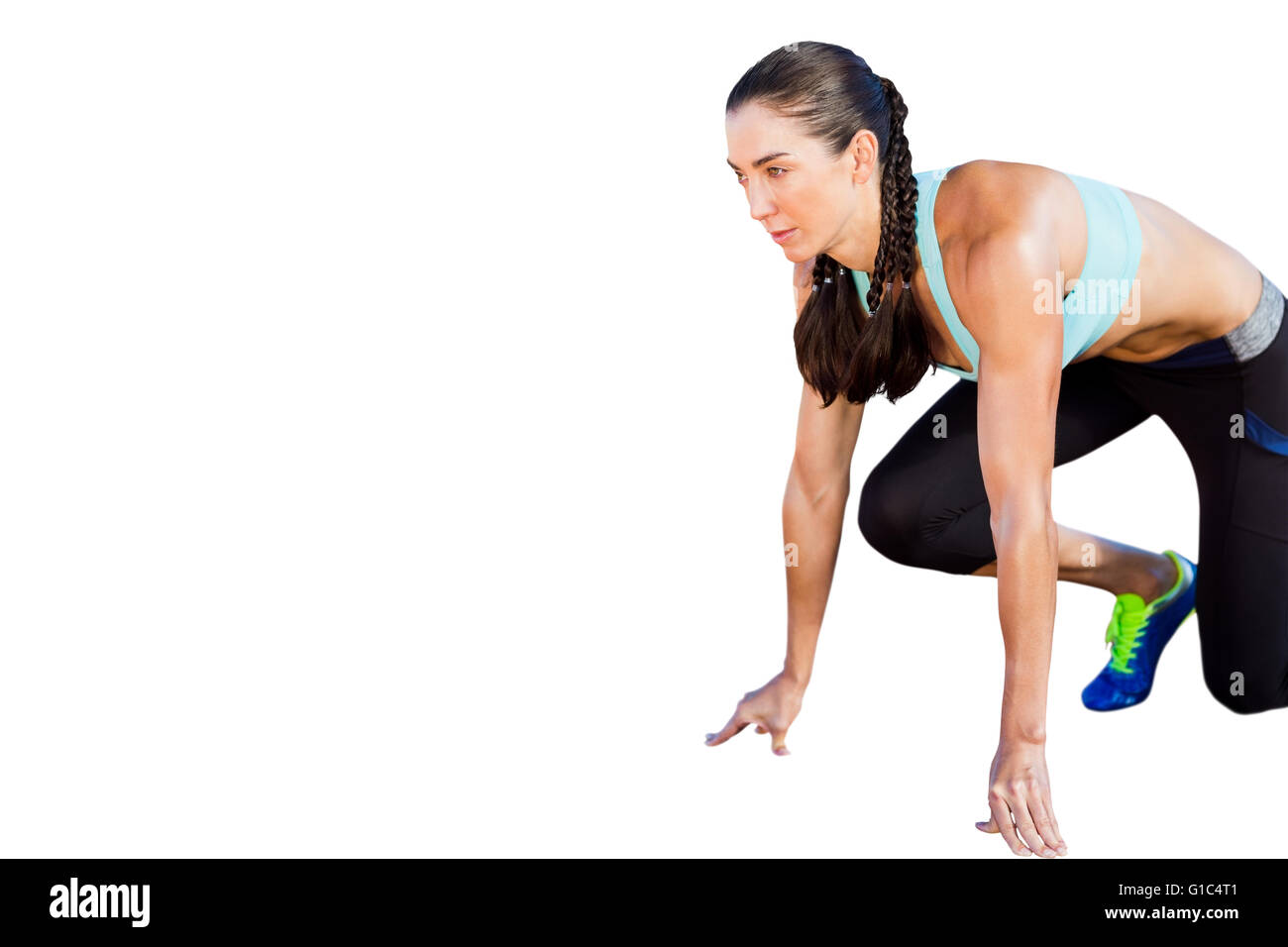 Side view of sporty woman in the starting block Stock Photo - Alamy