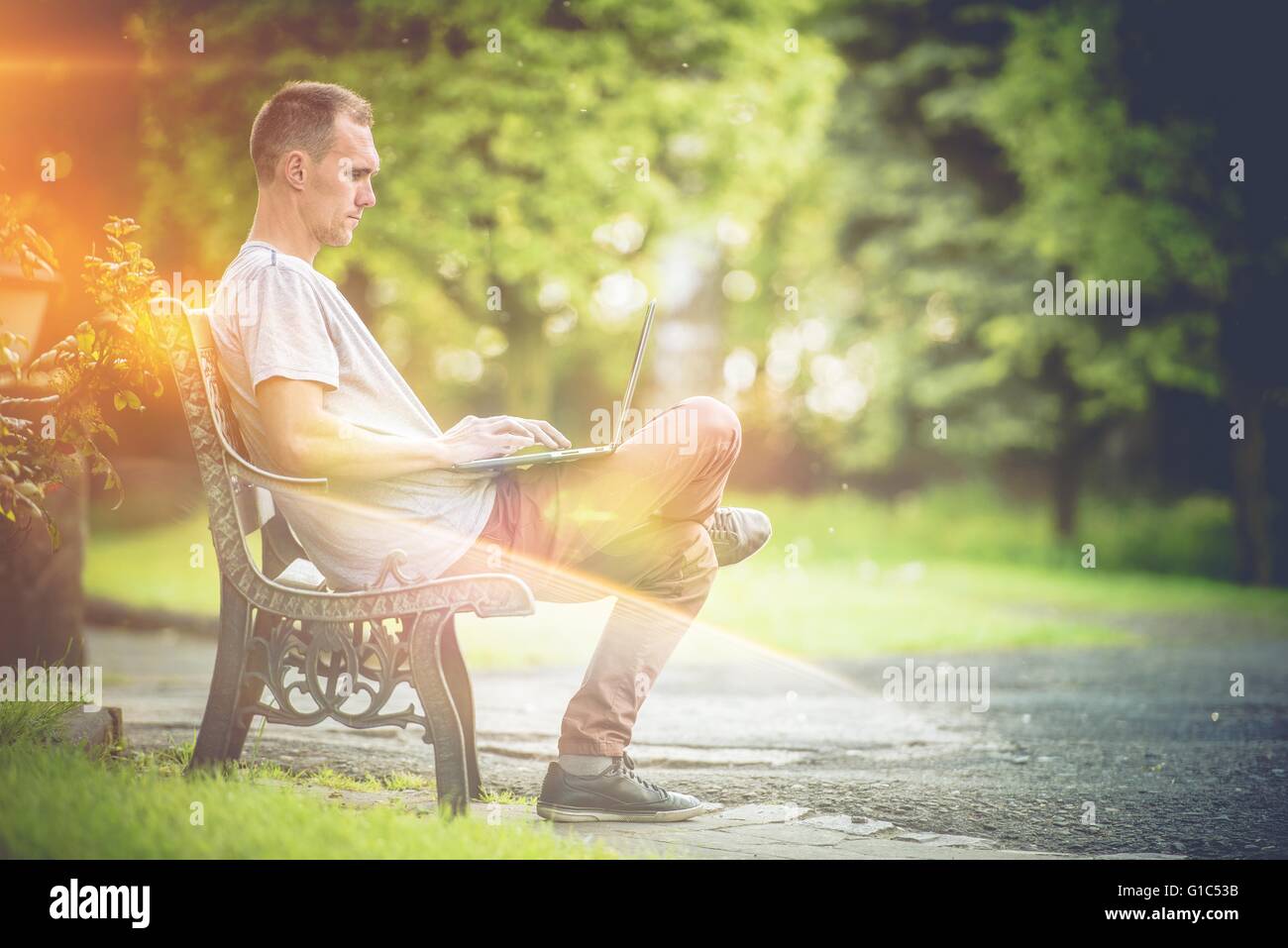 Outdoor Office Laptop Work. Men Working on His Laptop Computer in the ...