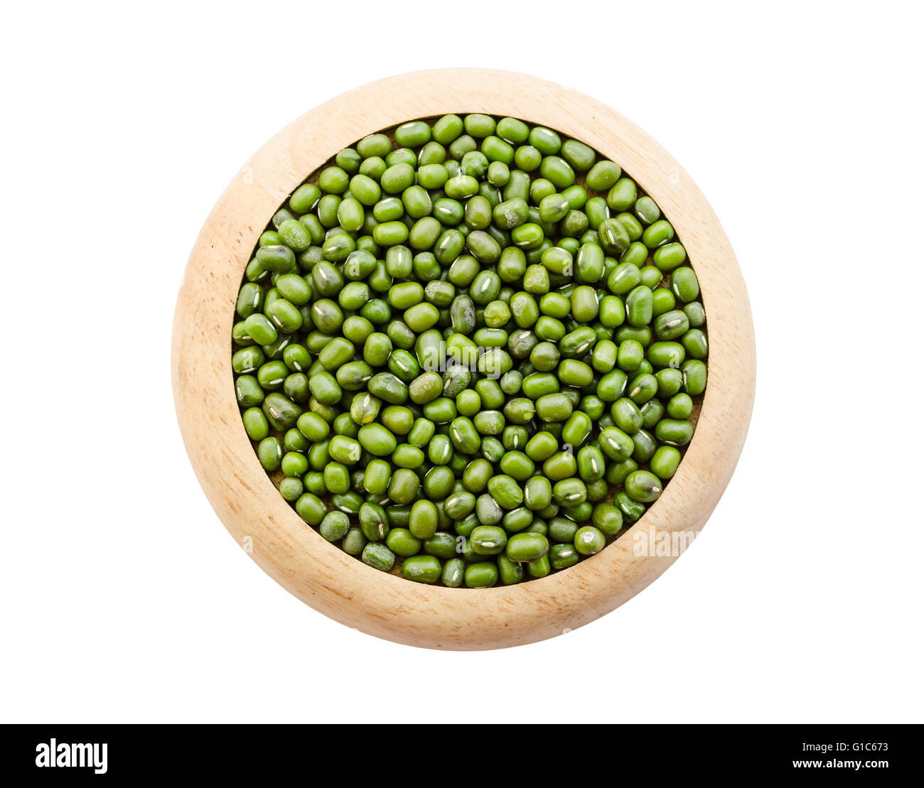 Green mung beans seeds in wooden dish isolated on white background ...