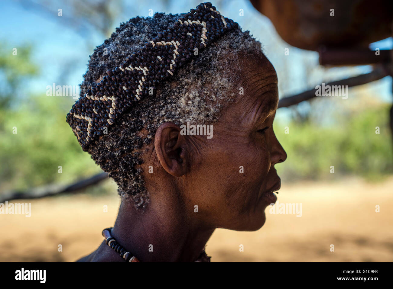 Portrait of a woman from the San tribe in the Living Museum of the Ju ...