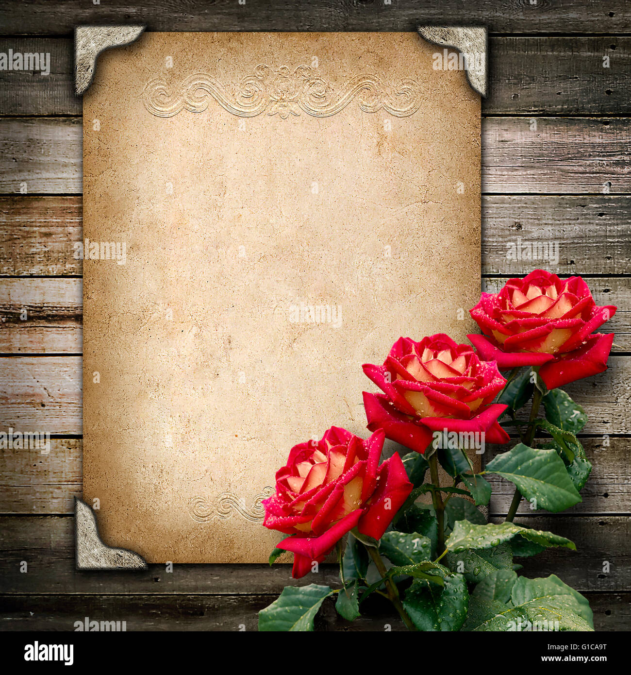 Old vintage frame for photos and a bouquet of red roses Stock Photo - Alamy