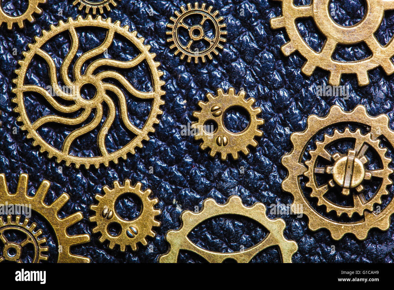 steampunk mechanical cogs gears wheels on leather background Stock ...
