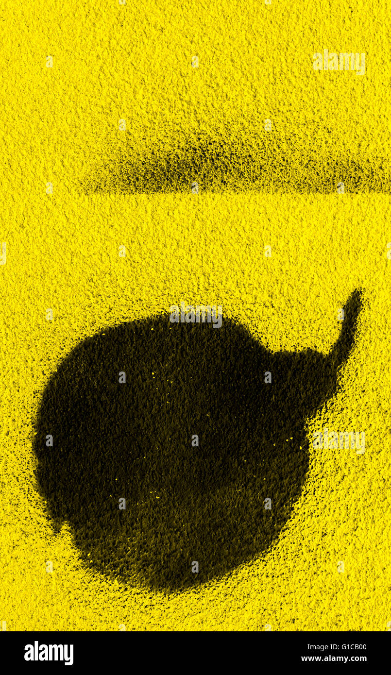 Bomb painted with black paint spray on yellow background Stock Photo ...