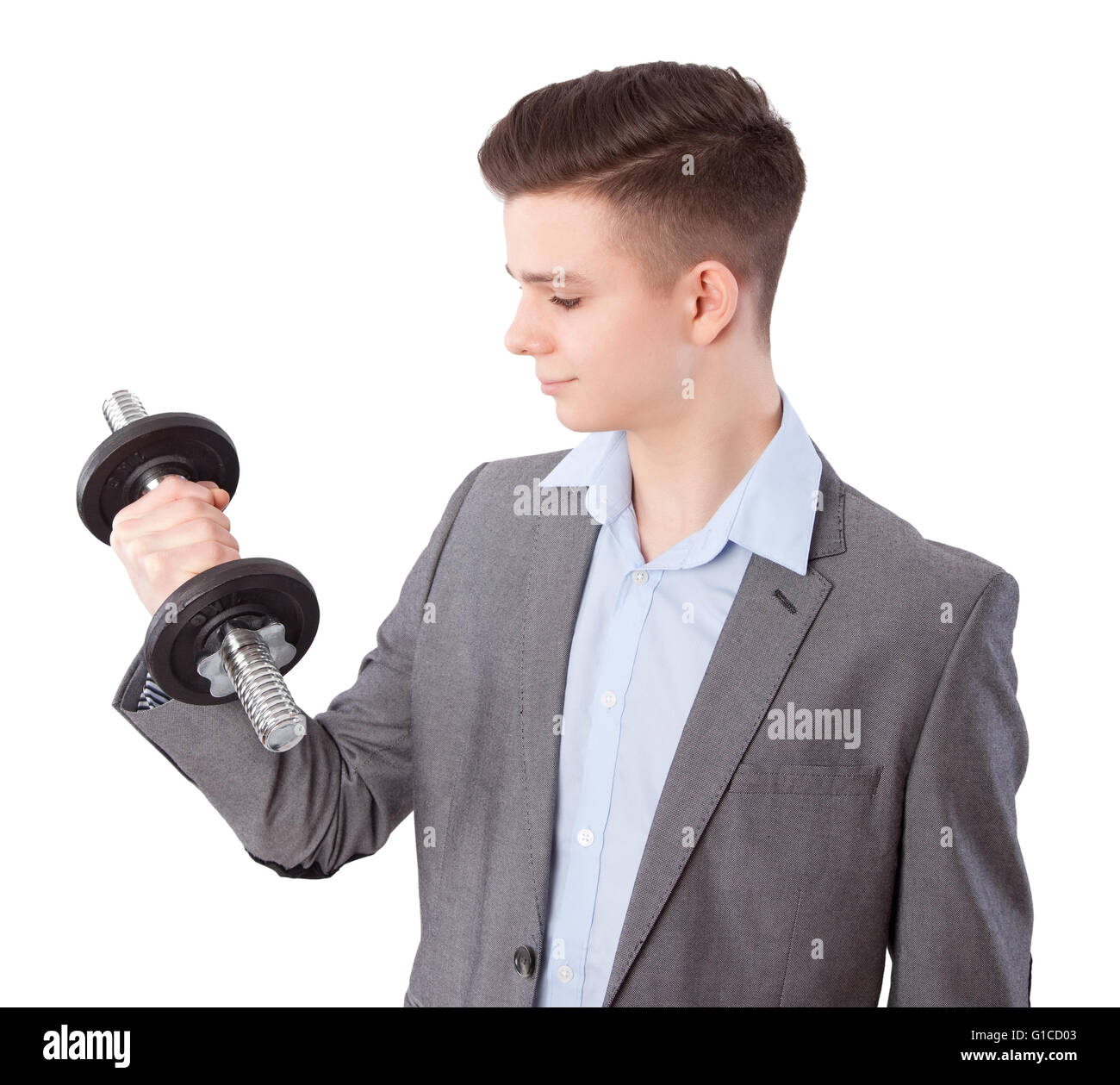 teenage boy exercising with dumbbell Stock Photo - Alamy