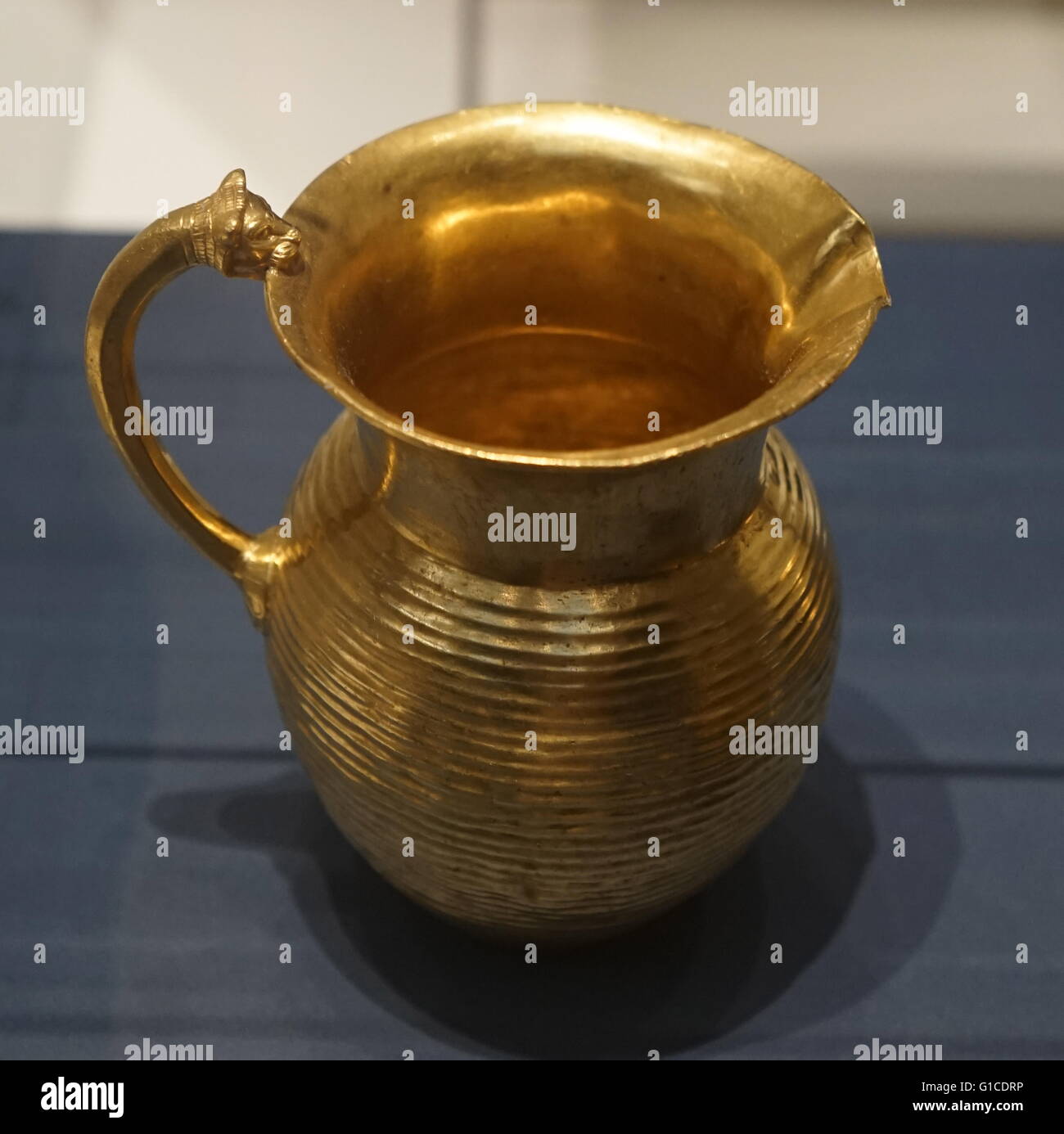 Golden jug with horizontal fluting, typical of Achaemenid metal work ...
