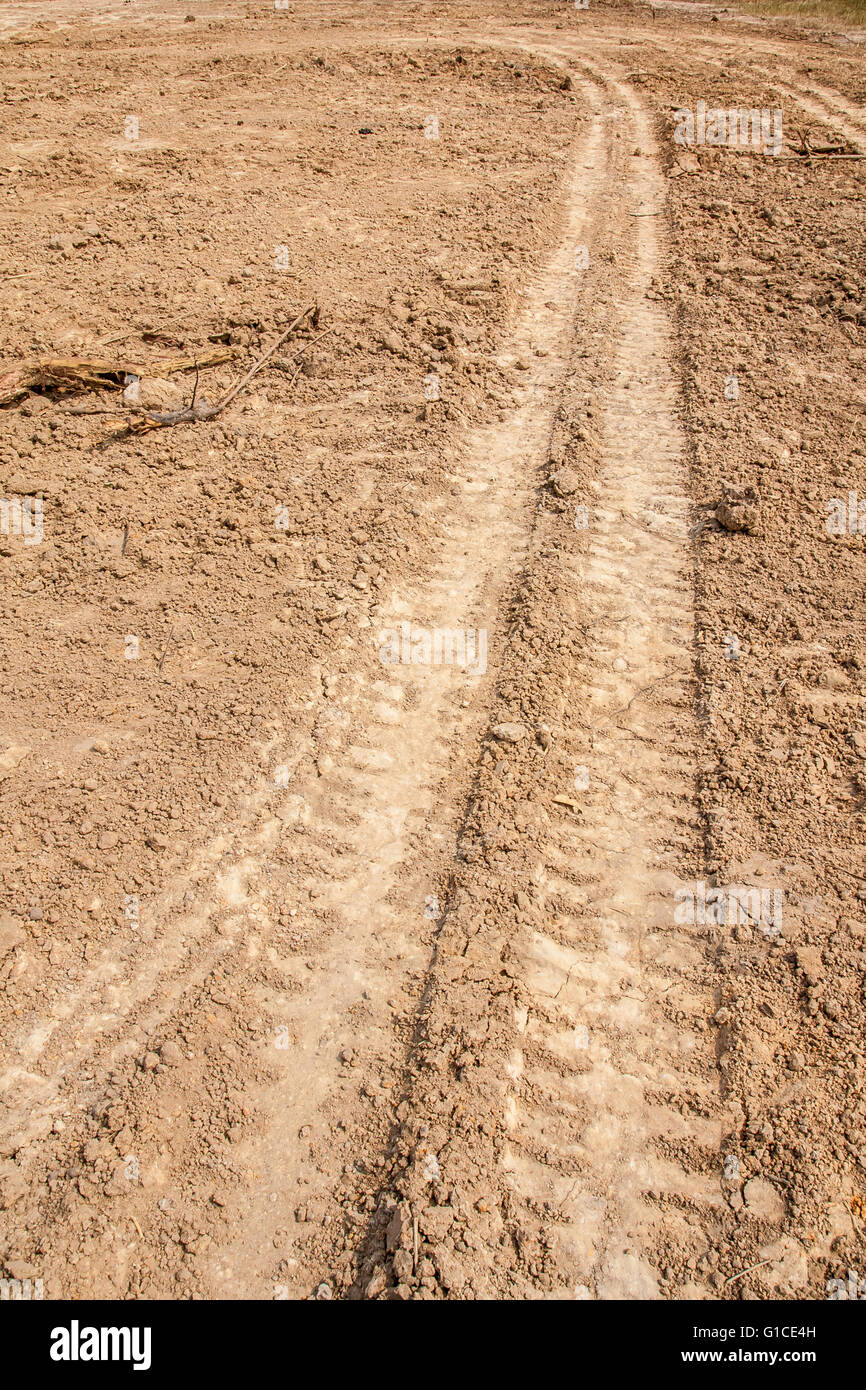tractor tyre tracks on the ground Stock Photo - Alamy
