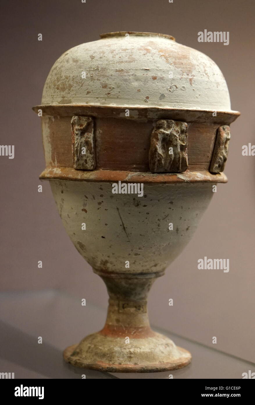 Oval pottery vessel with relief decoration, from Libya. Dated 200 BC ...