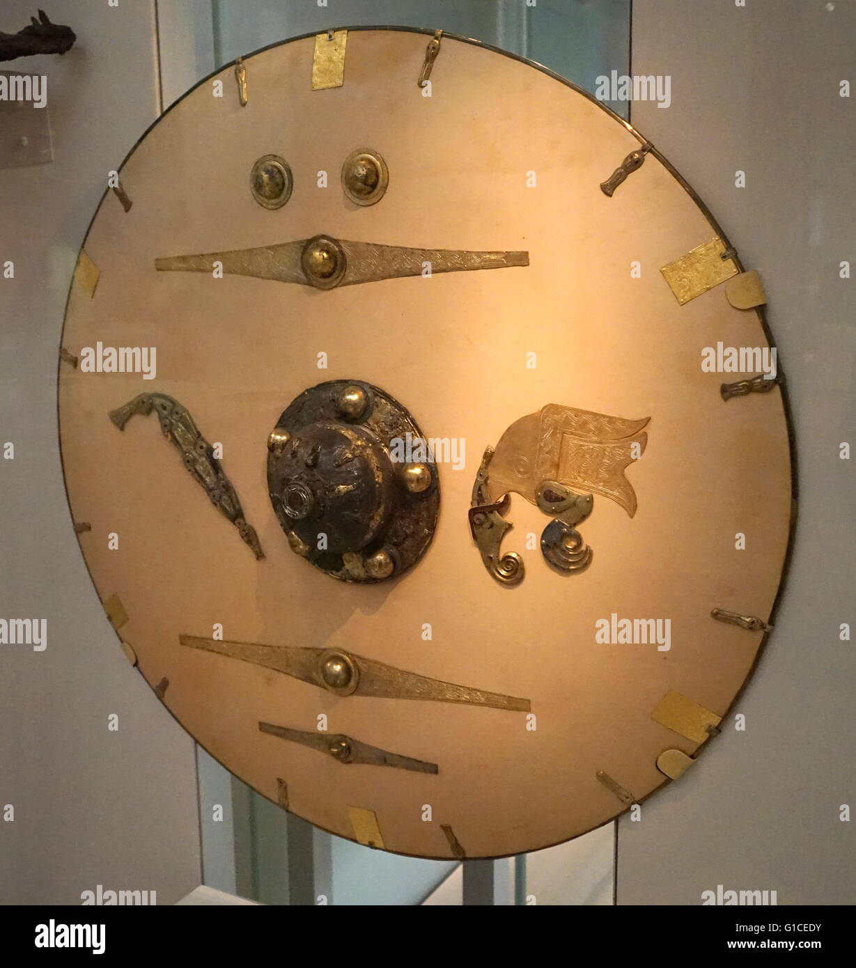 Anglo-Saxon shield with a metal rim and gilded copper alloy, gold and ...