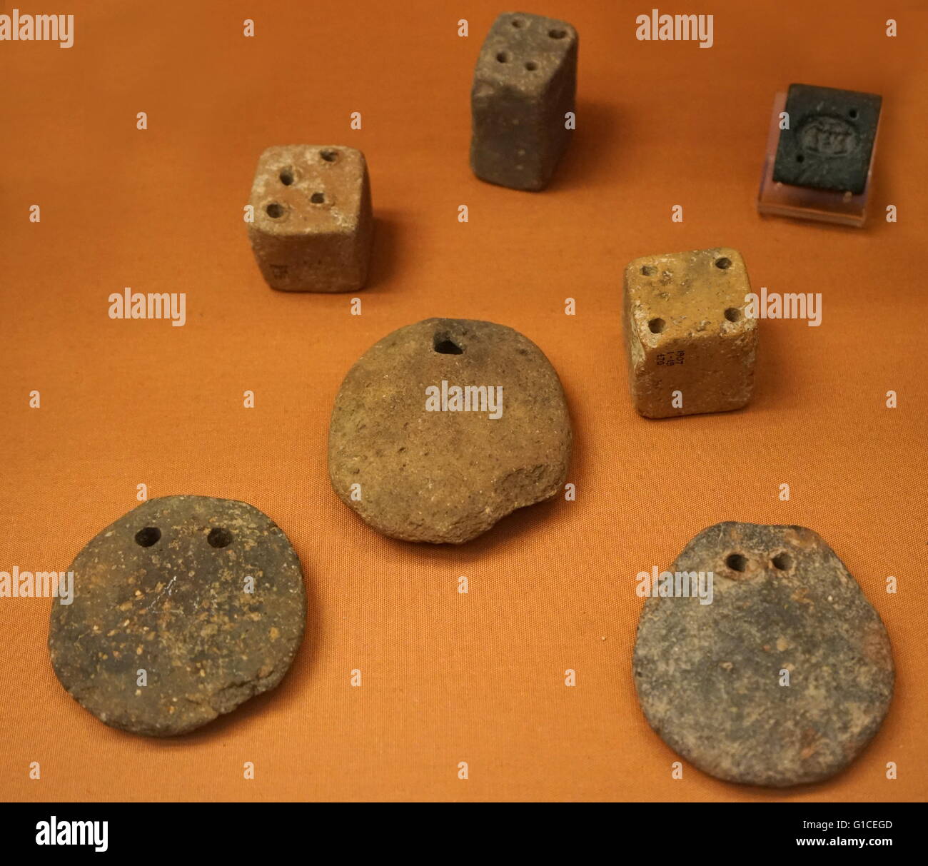 Loom weights hi-res stock photography and images - Alamy