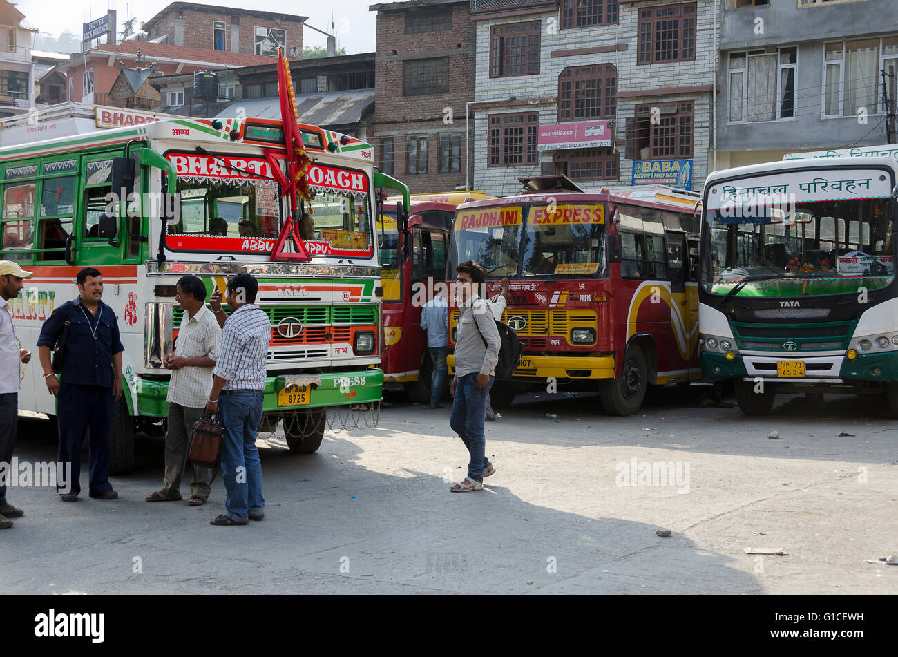 Ornately decorated buses at bus station, Manali, Himachal Pradesh ...