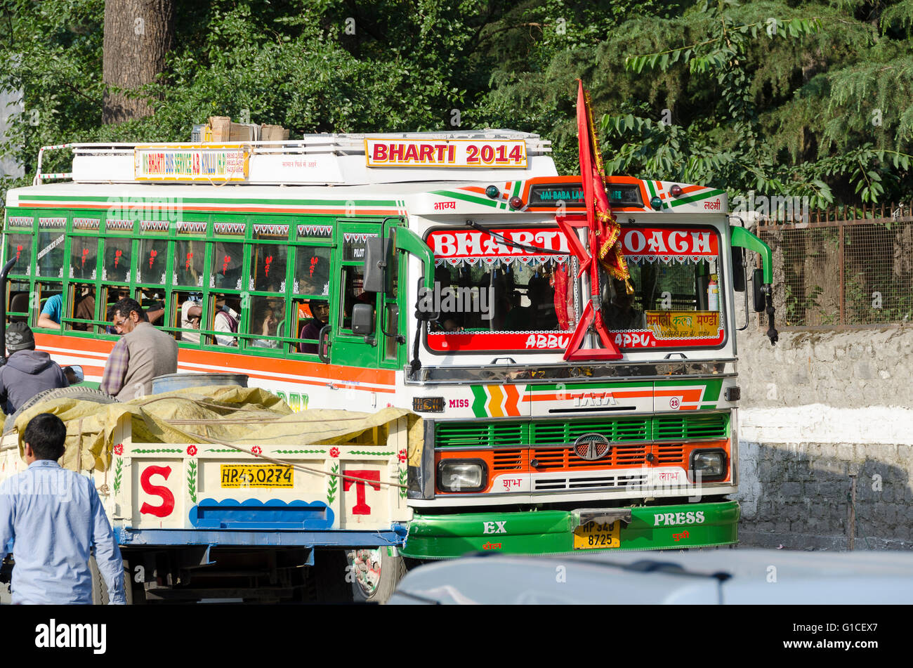 Ornately decorated bus in traffic, Manali, Himachal Pradesh, India ...