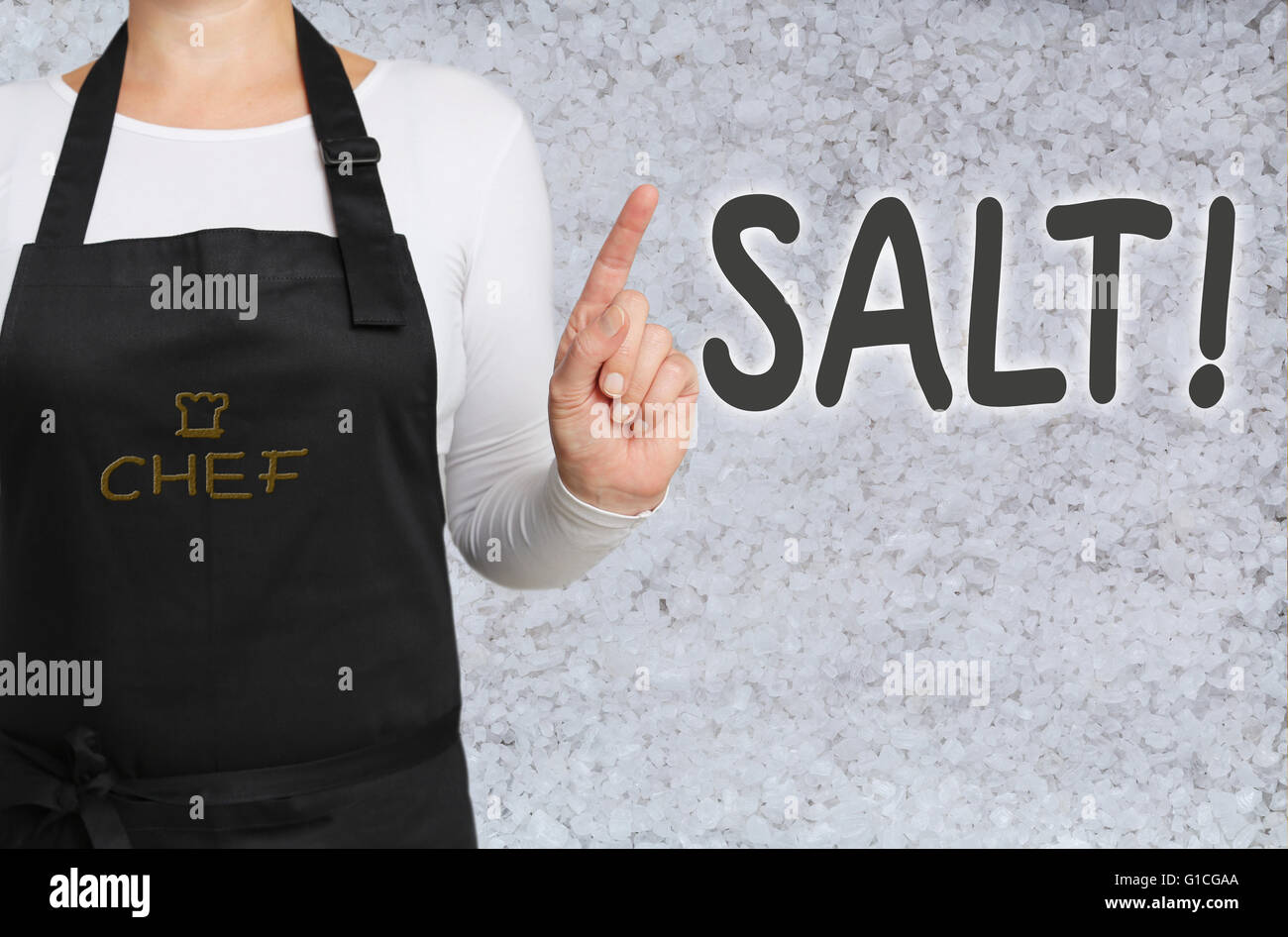 Chef with salt background concept template Stock Photo - Alamy