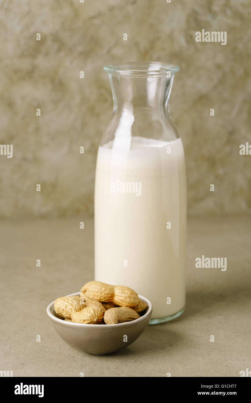 Peanut milk in a bottle Stock Photo - Alamy