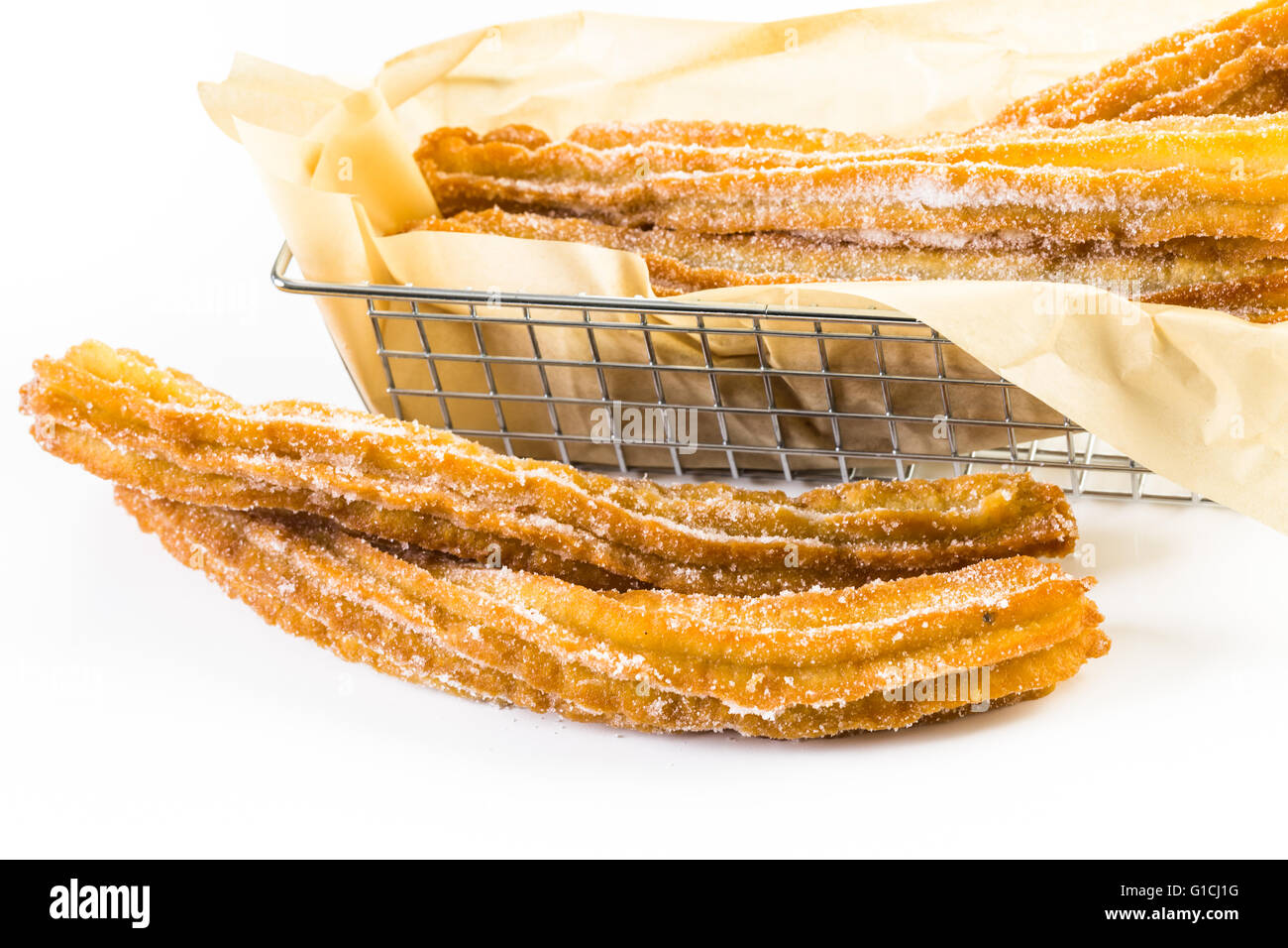 Bunch of curros covered with granulated sugar Stock Photo - Alamy