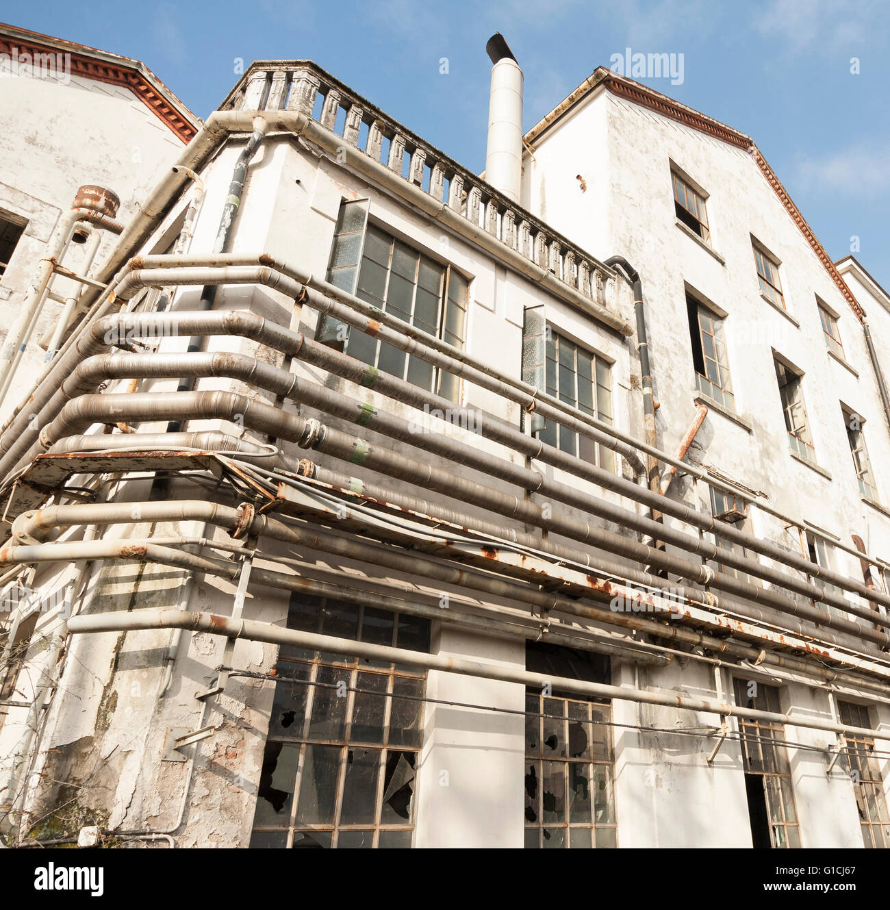 Pipes on outside wall building hi-res stock photography and images - Alamy