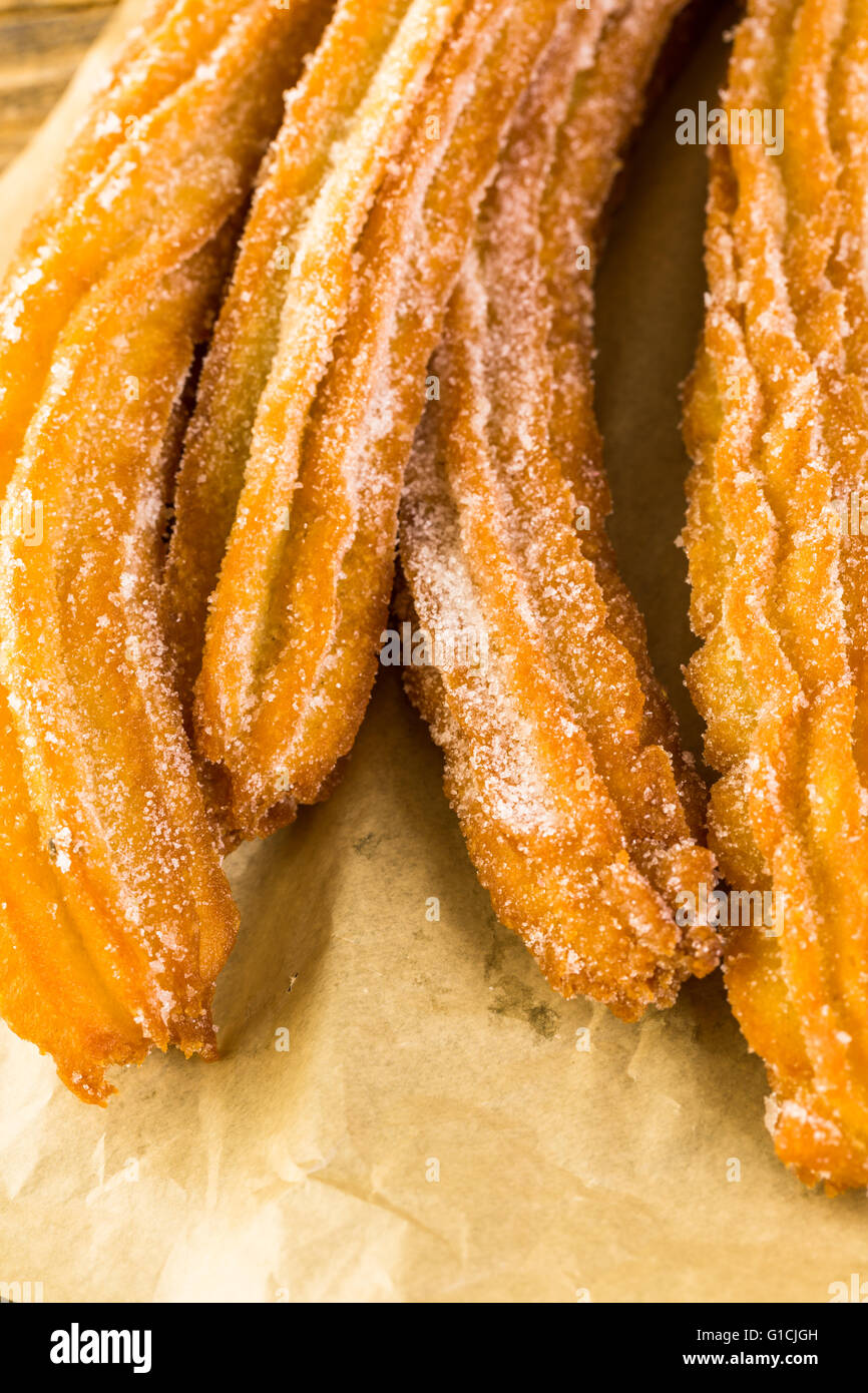 Bunch of curros covered with granulated sugar Stock Photo - Alamy