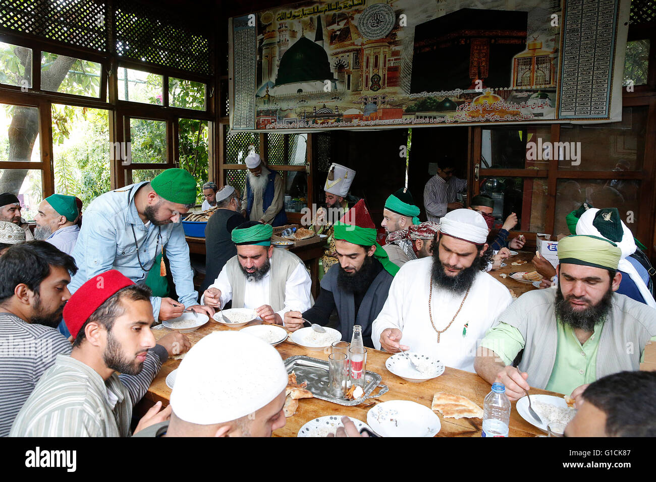 Naqshbandi sufi muslims eating in the Lefke dergah, Cyprus Stock Photo ...