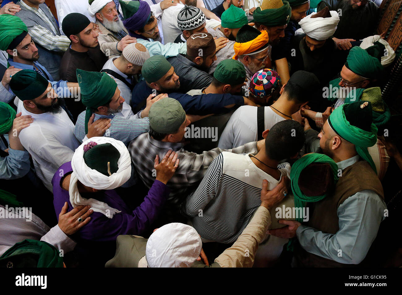 Naqshbandi sufis performing the bayah ritual with Mawlana Shaykh Mehmet ...