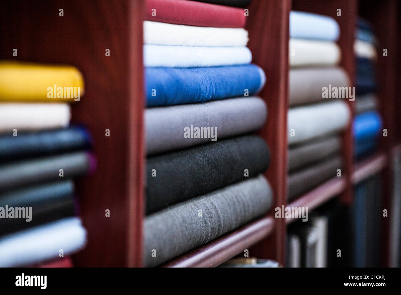 Many types of fine cloth at a bespoke tailor shop Stock Photo - Alamy