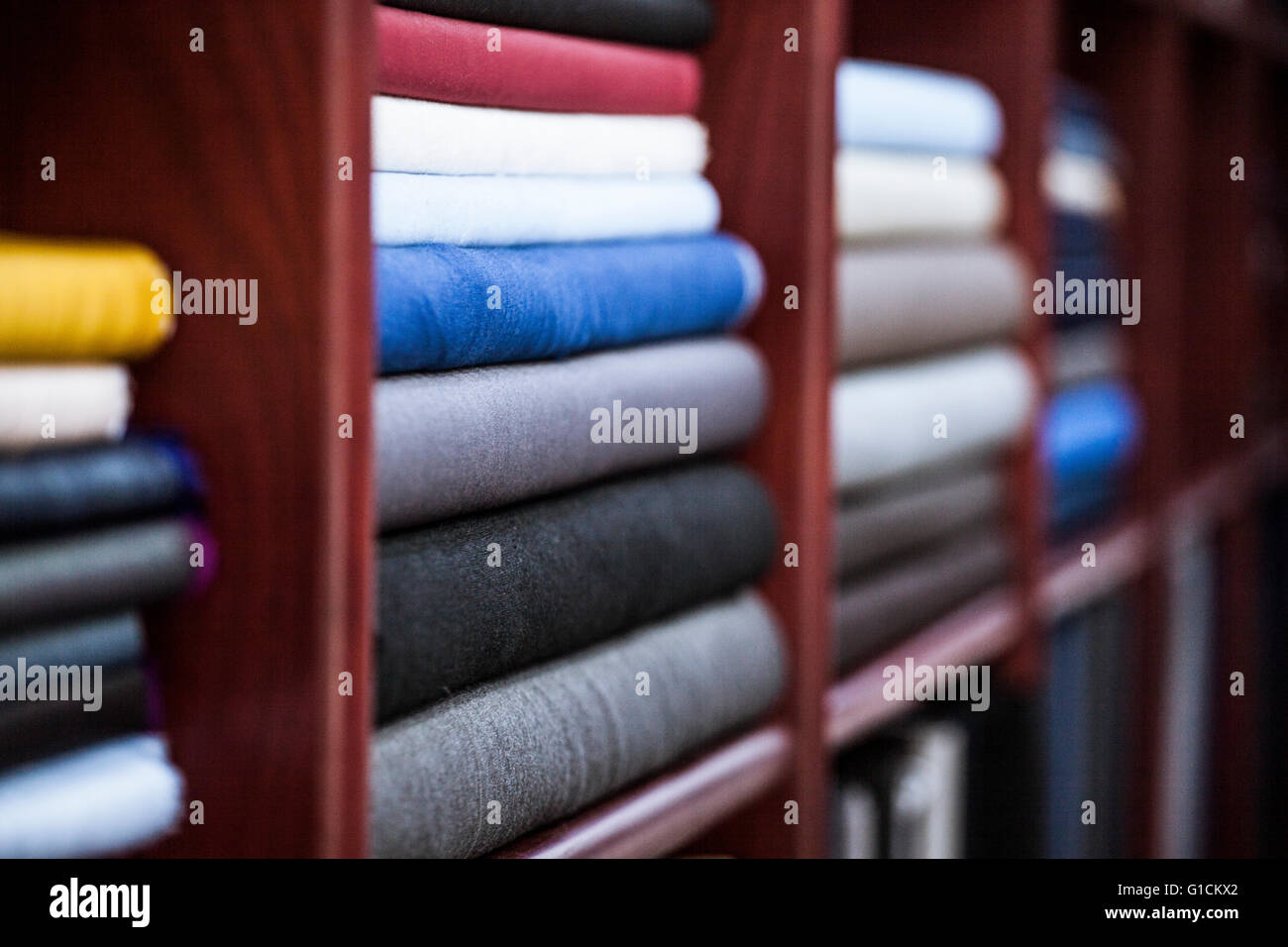 Many types of fine cloth at a bespoke tailor shop Stock Photo - Alamy