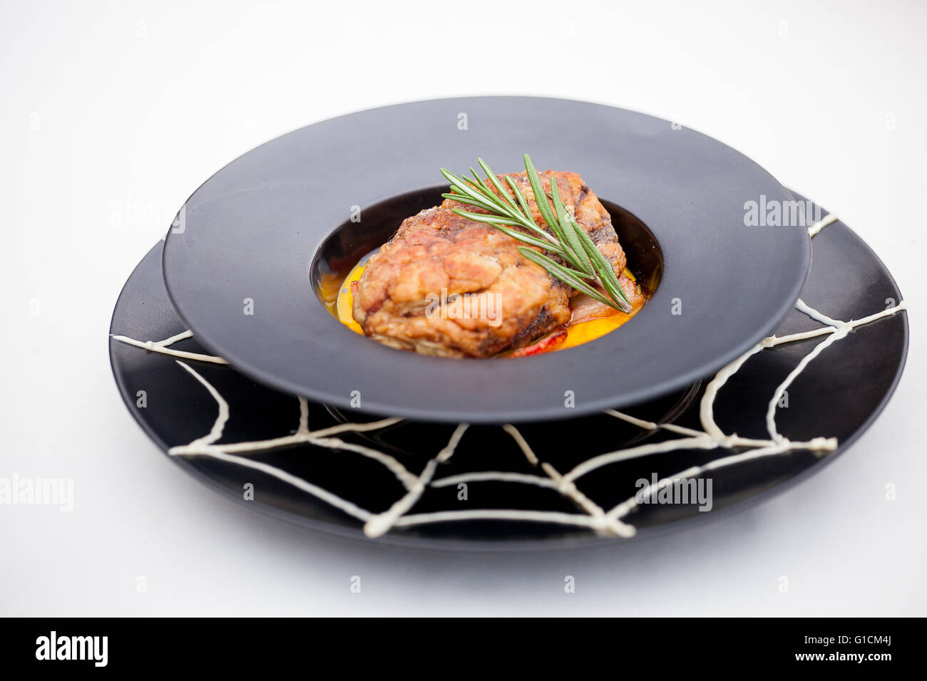 roasted fish with rosemary Stock Photo - Alamy